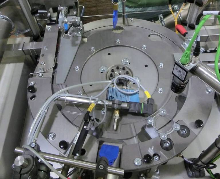 Inspection systems for quality controlling processing units.